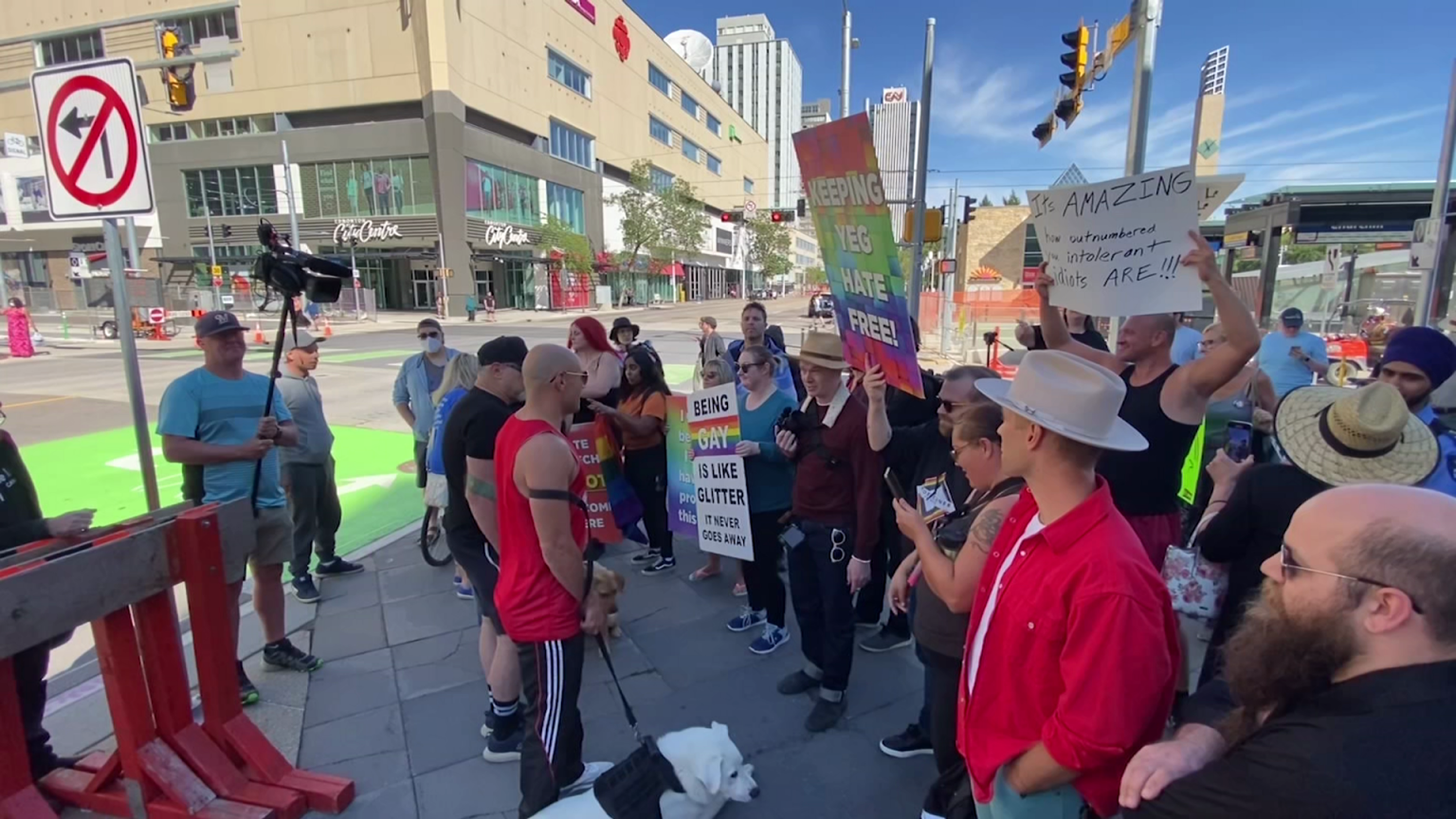 Drag queen story time for kids: protesters in Edmonton outside library